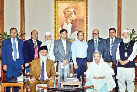 PM receives donation cheques from banks