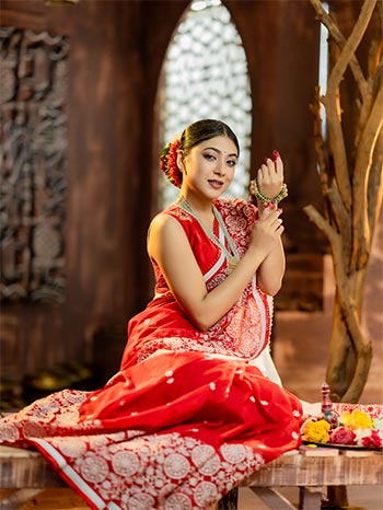 Durga Puja celebration with traditional clothes